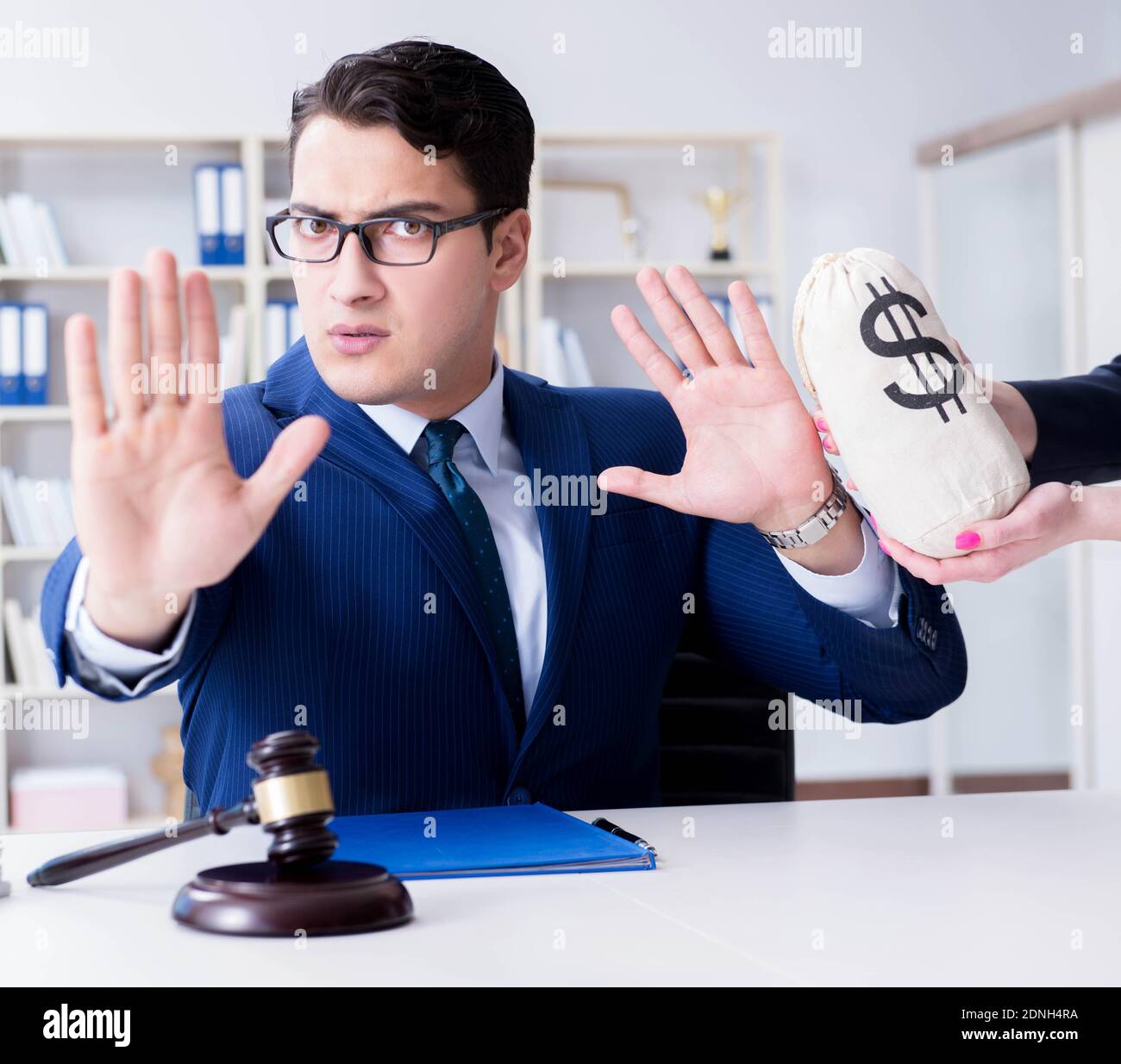 The judge in bribe concept with money Stock Photo - Alamy