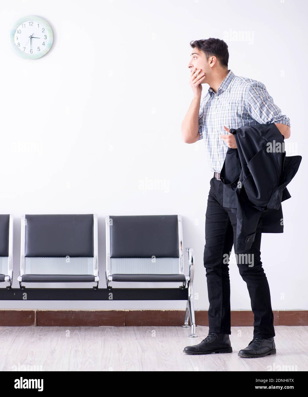 The man nervously impatiently waiting in the lobby Stock Photo - Alamy