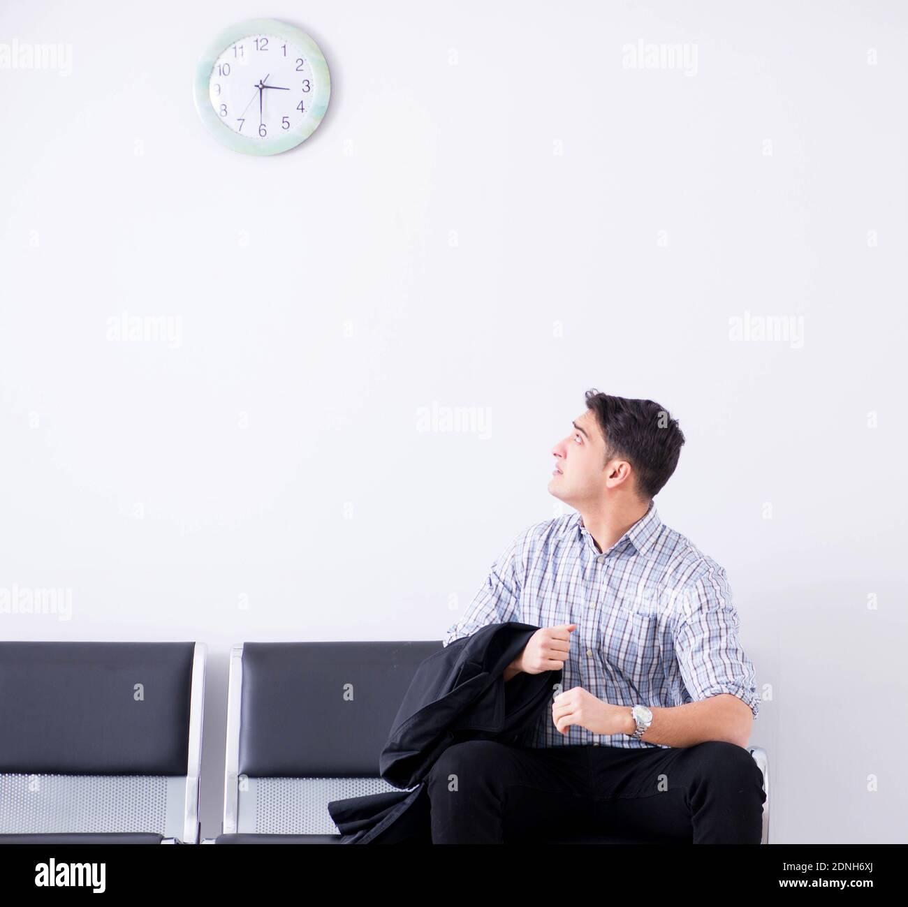The man nervously impatiently waiting in the lobby Stock Photo - Alamy