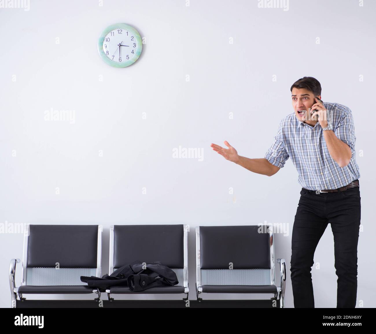 The man nervously impatiently waiting in the lobby Stock Photo - Alamy
