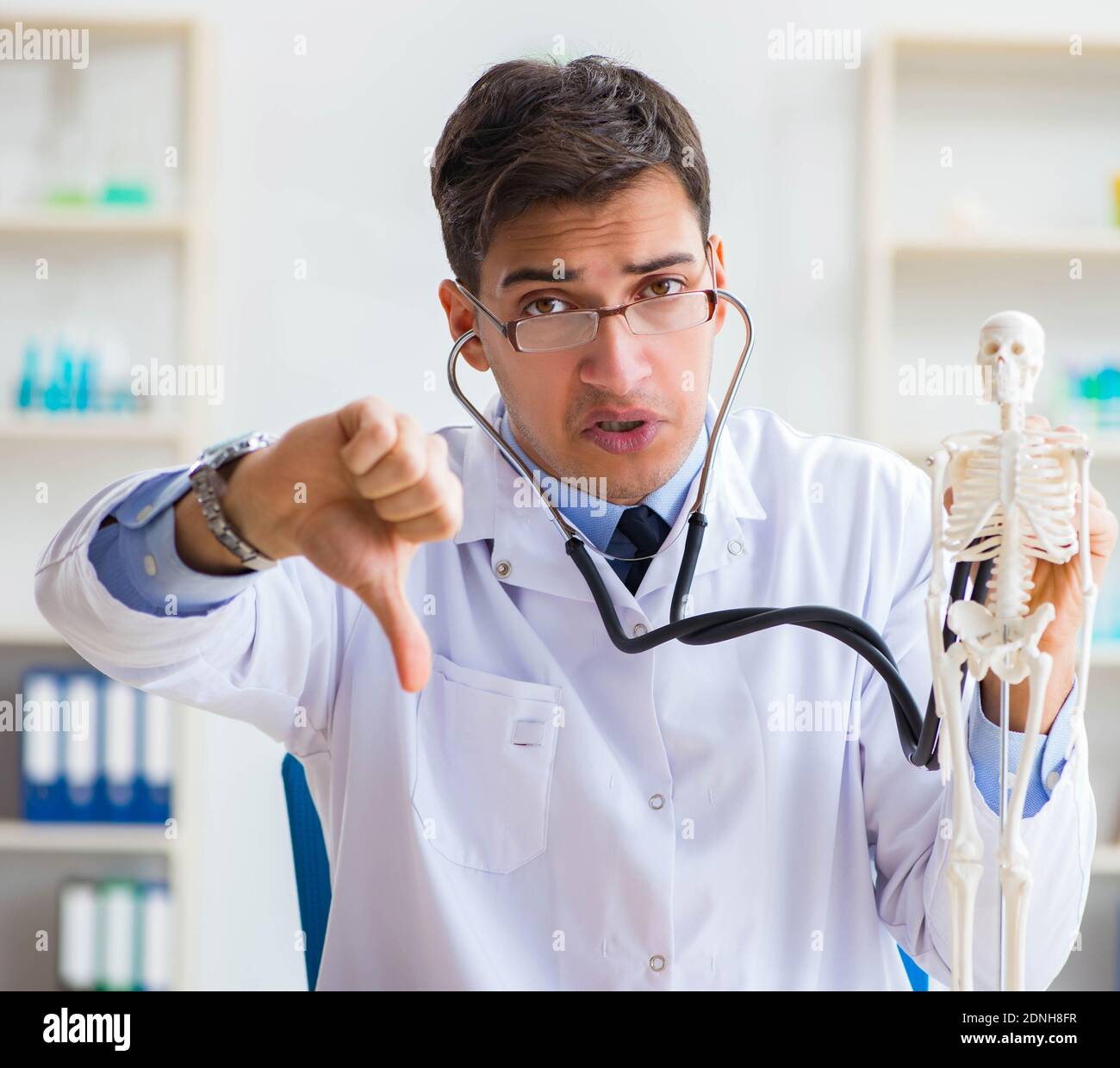The doctor student studying the bones of skeleton Stock Photo - Alamy