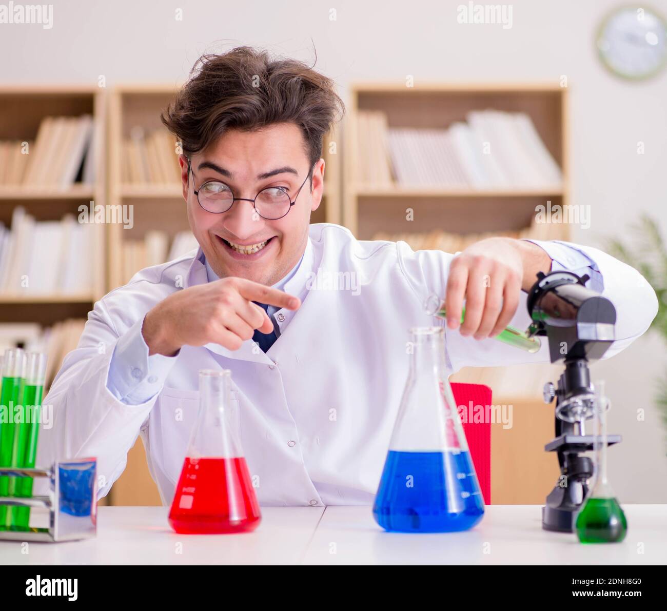 The mad crazy scientist doctor doing experiments in a laboratory Stock ...