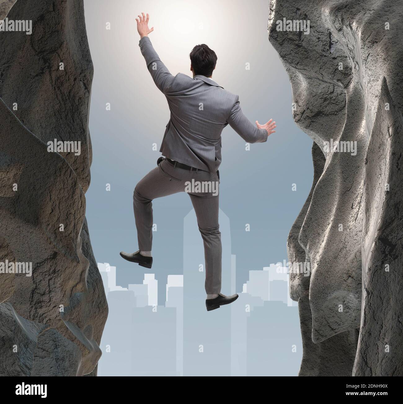 The businessman overcoming challenges in business concept Stock Photo ...