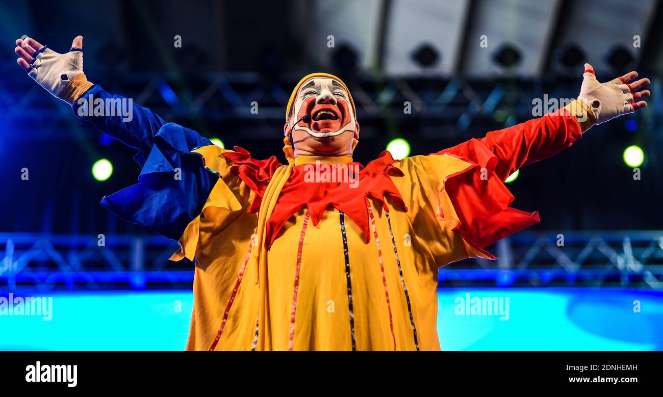 Clown Standing With Arms Outstretched Performing On Stage Stock Photo ...