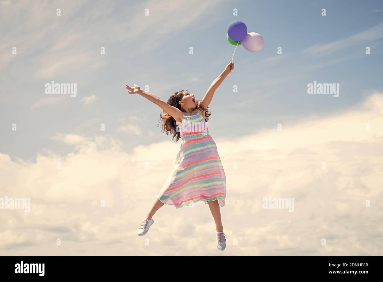 fly away. happy childhood. little child with balloons. Entertainment ...