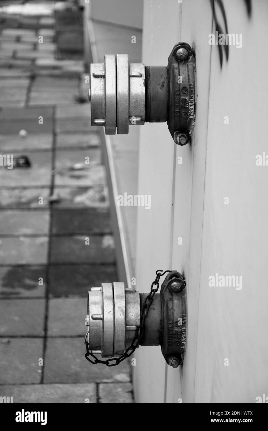 Fire hydrant on wall hi-res stock photography and images - Alamy