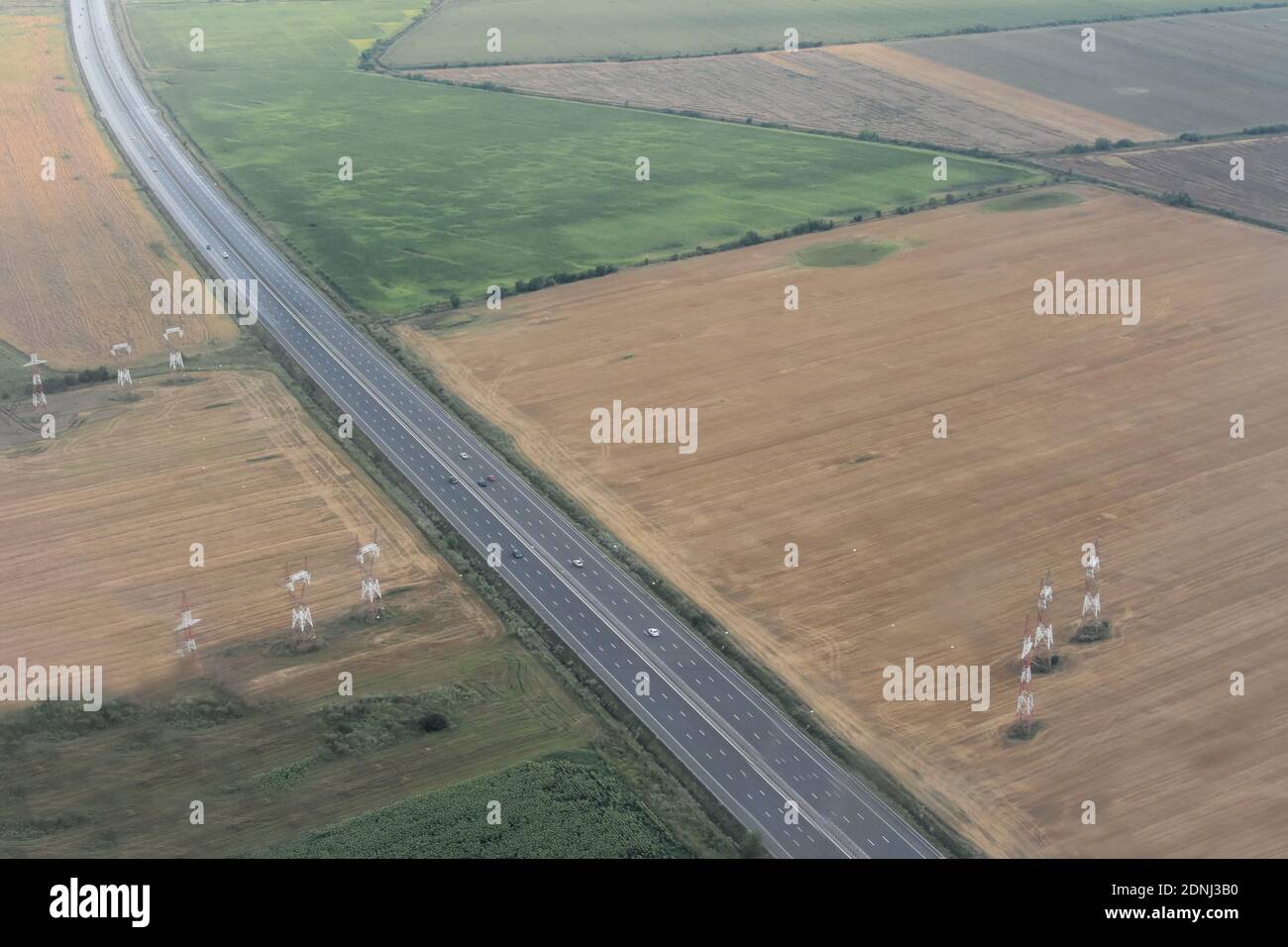 Aerial view of a road and agricultural land Stock Photo - Alamy
