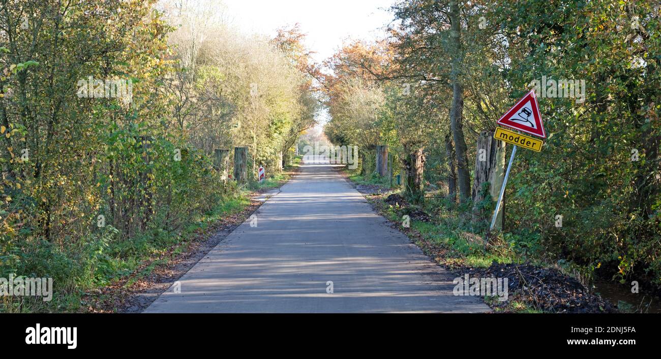 Small road in the Netherlands with a sign saying 'Modder' (Mud on the ...