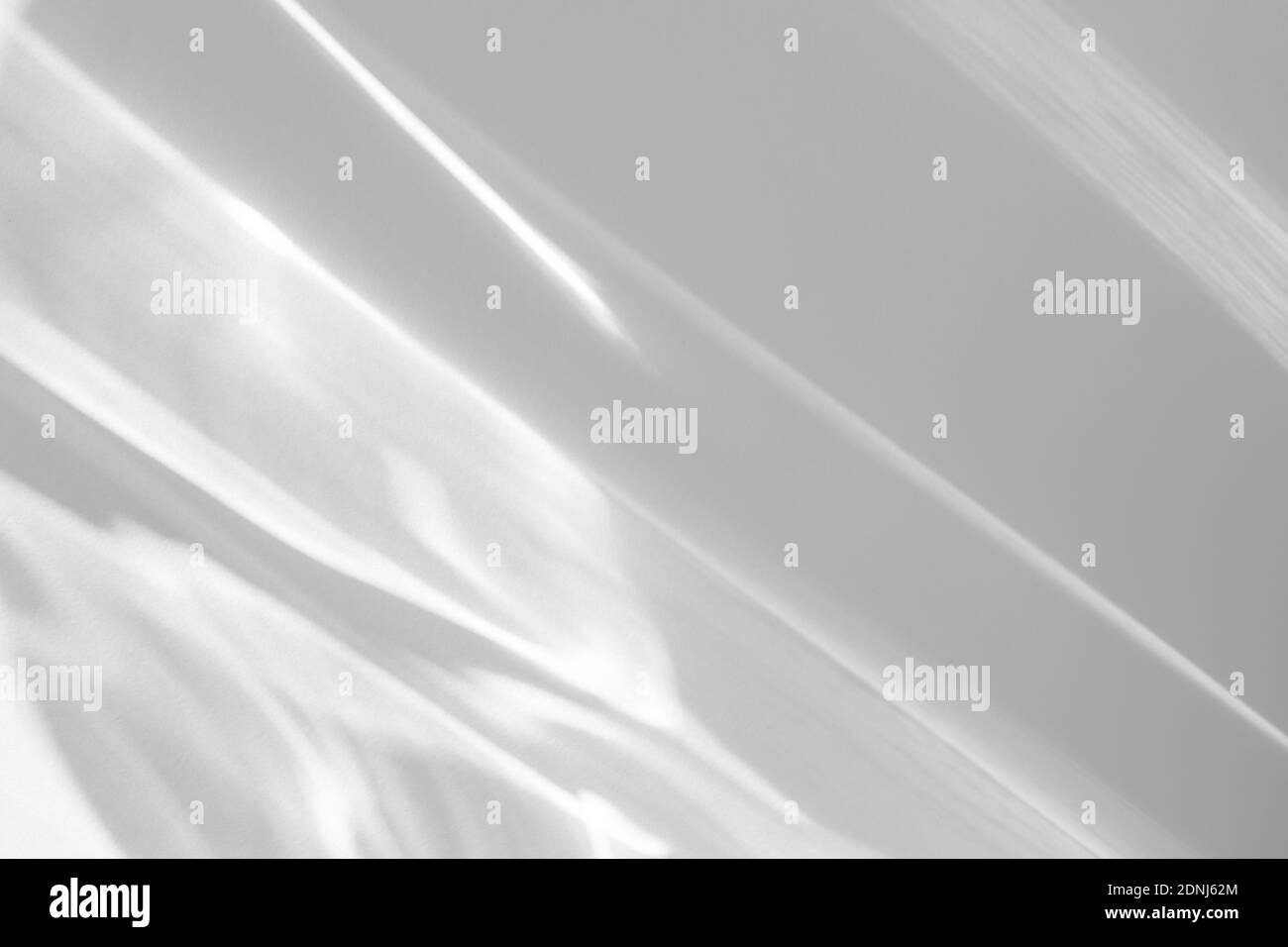 shadow and light caustic effect on a white wall Stock Photo - Alamy