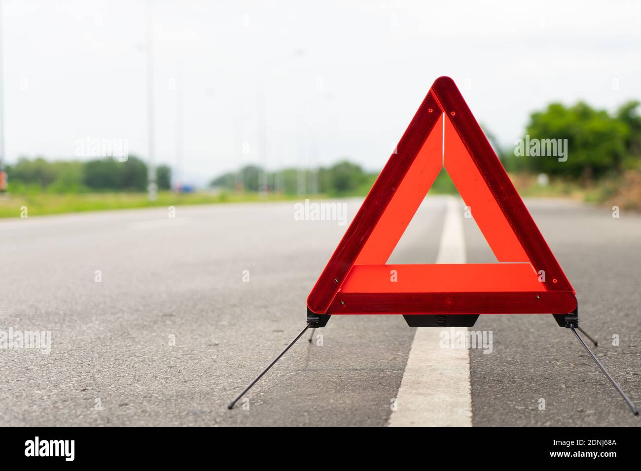 Close-up Of Warning Sign On Road Stock Photo - Alamy