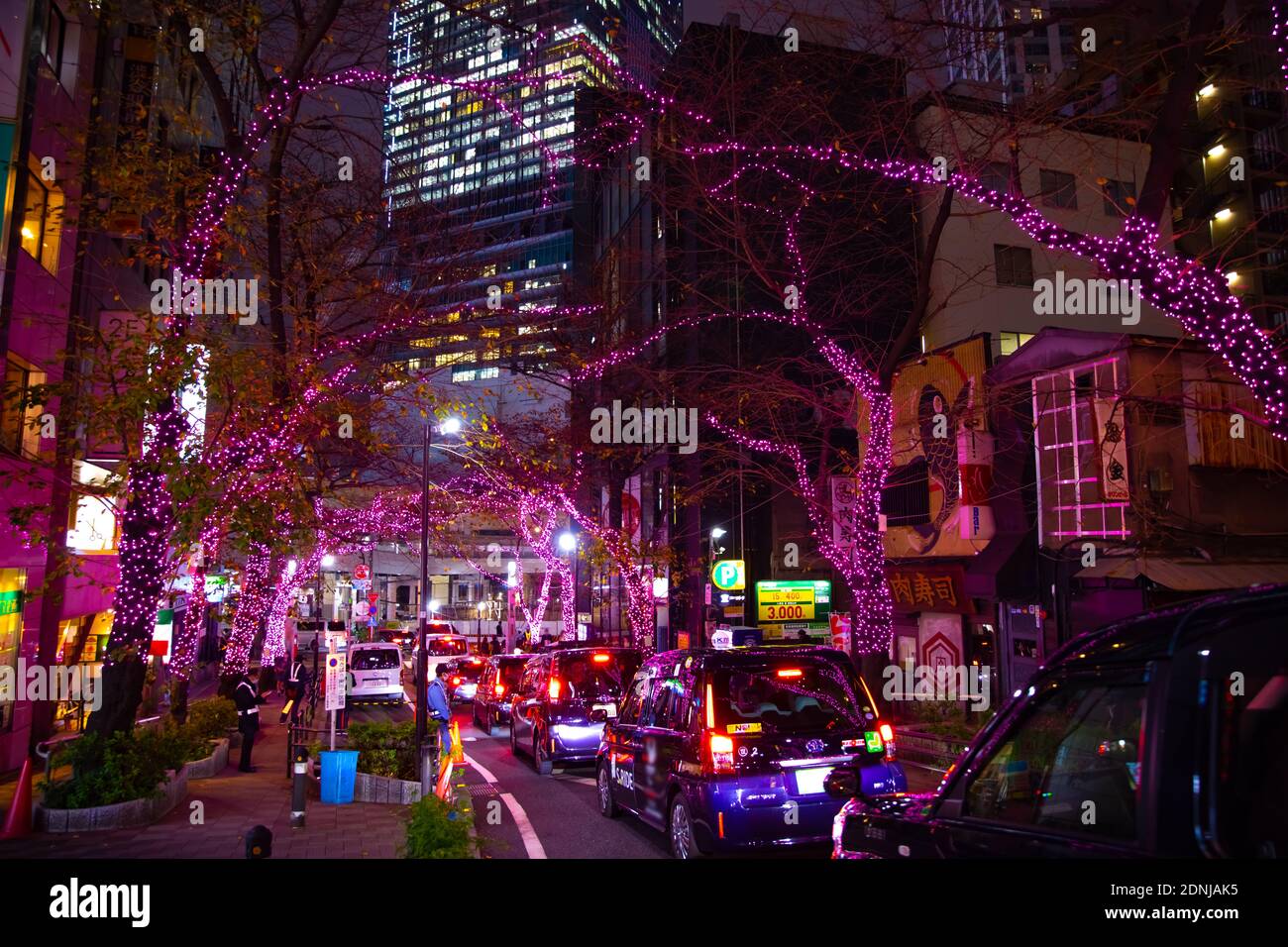 A night illuminated street in Shibuya wide shot Stock Photo - Alamy
