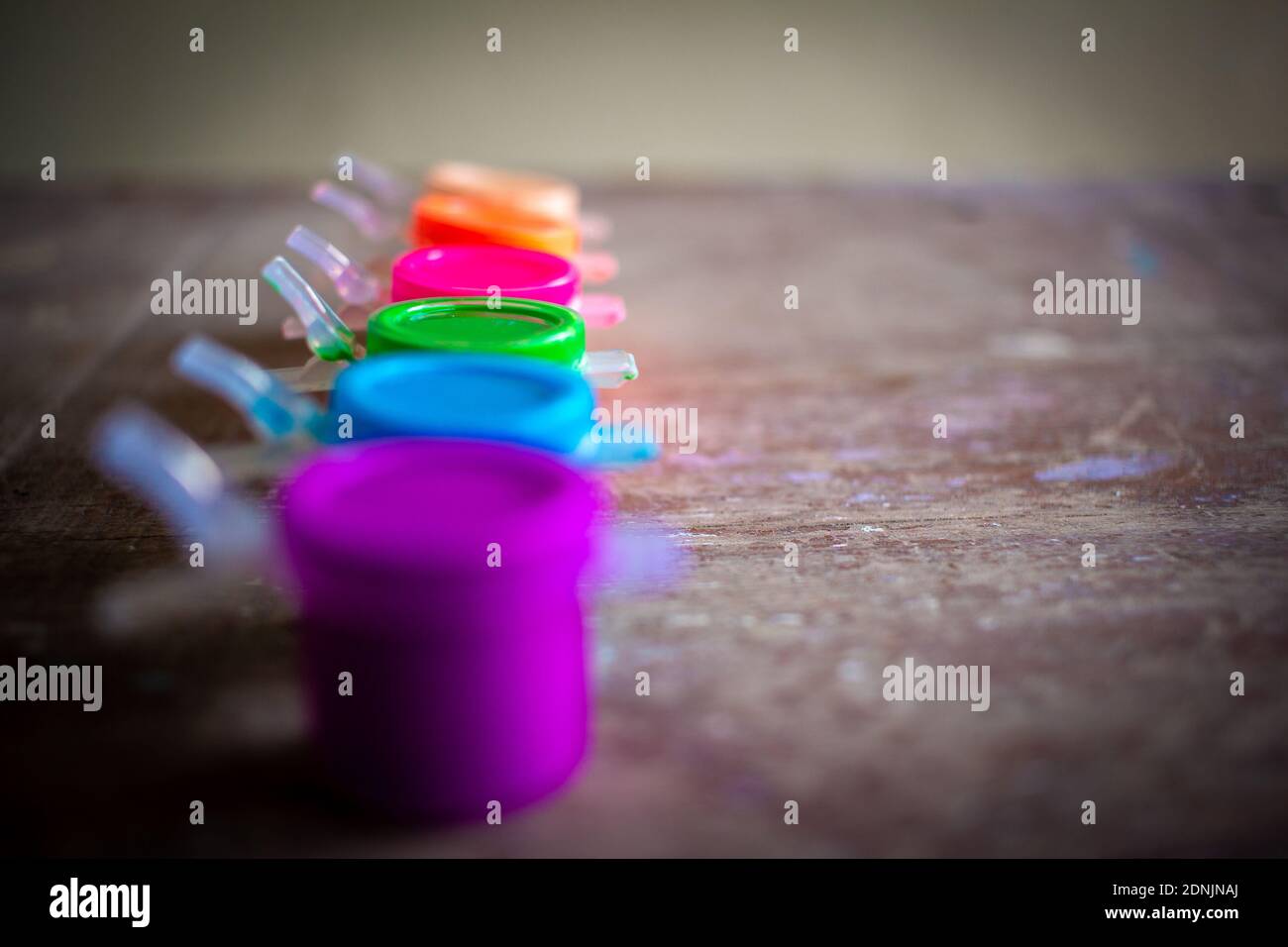 Close view of the color containers used for coloring Stock Photo - Alamy