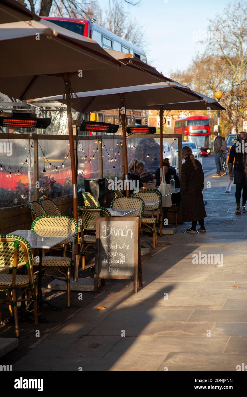 Minnow Cafe Tables on Pavement in Clapham Common, London UK Stock Photo ...