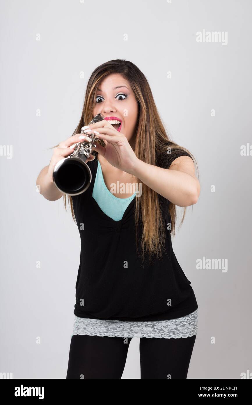 Woman playing clarinet hi-res stock photography and images - Alamy