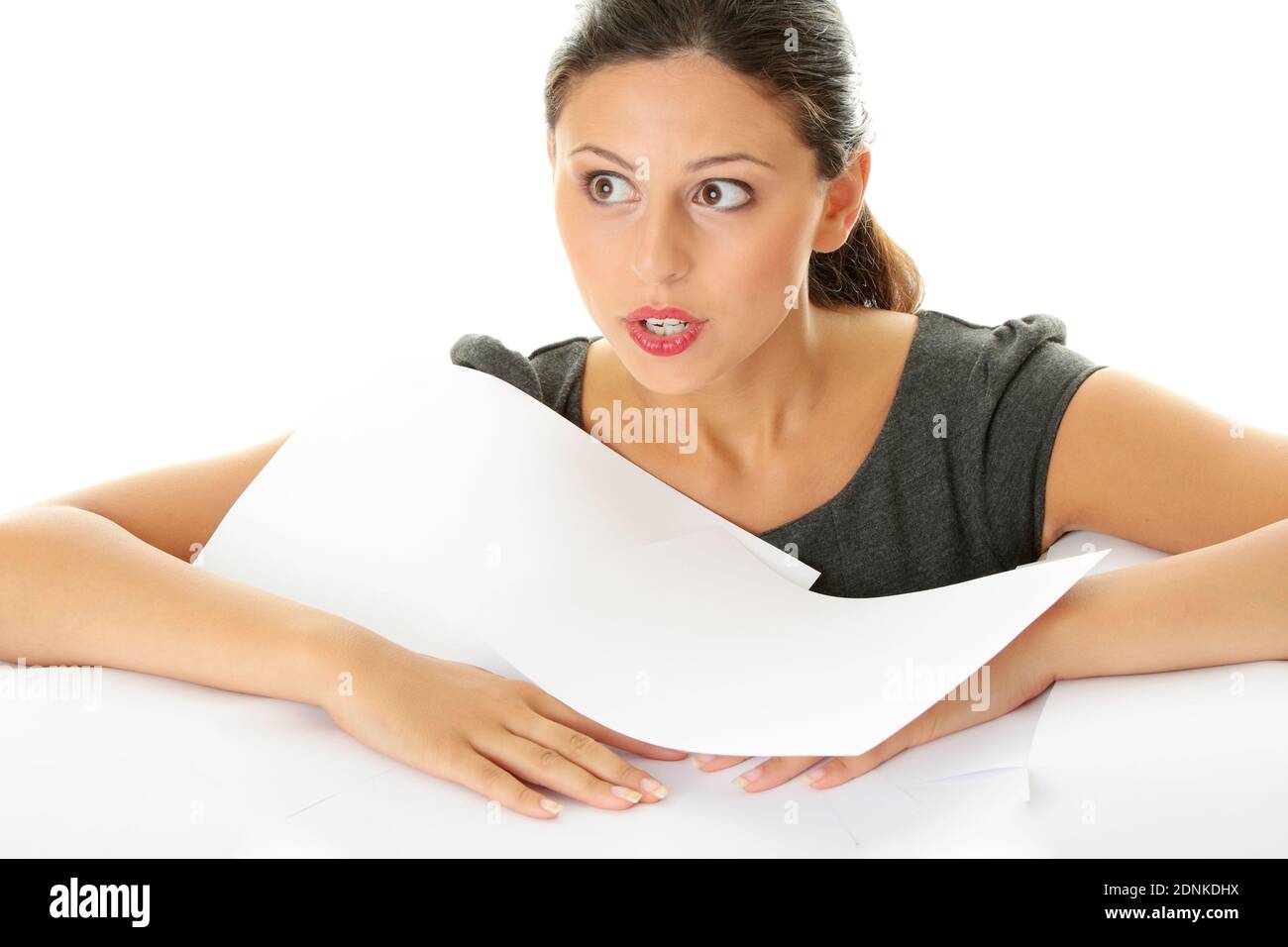 Woman holding papers shocked hi-res stock photography and images - Alamy