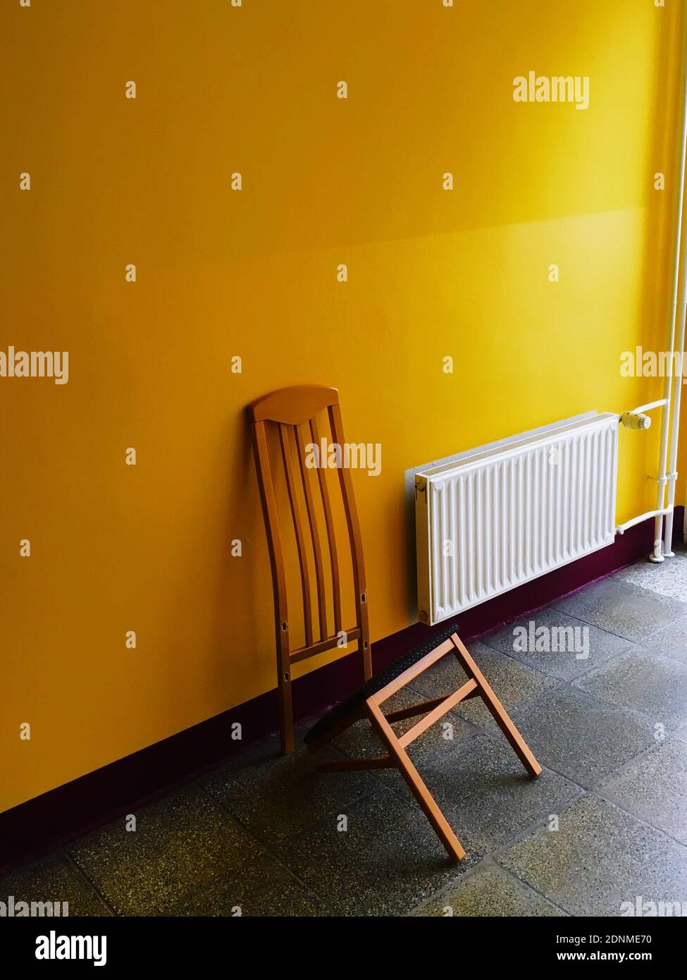 Broken Chair Against Wall At Home Stock Photo - Alamy