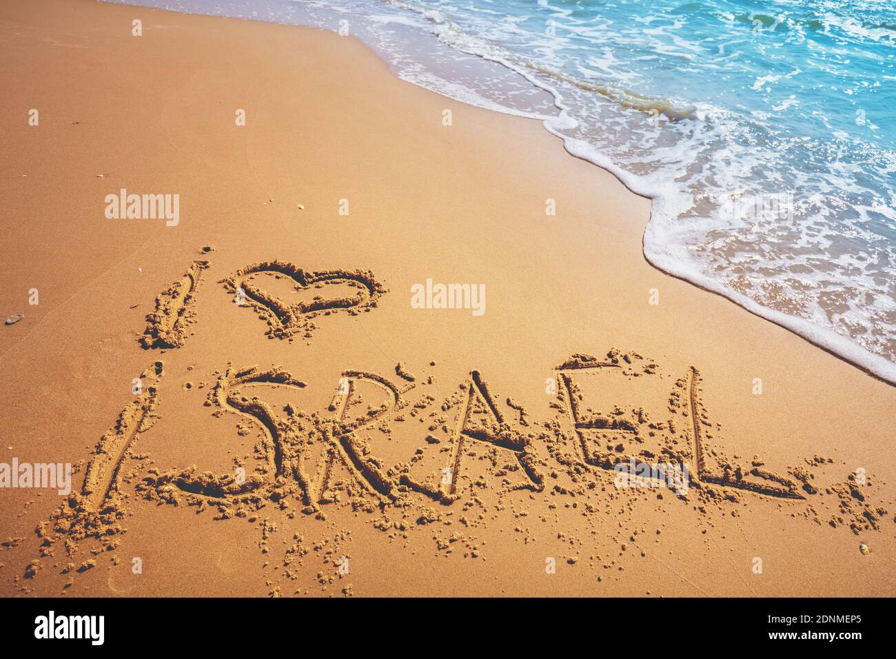 The words I love Israel on the beach sand. Inscription I love Israel on ...