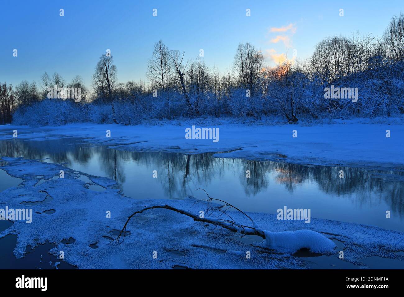 Severe winter not frozen river ice and snow scenery Stock Photo - Alamy