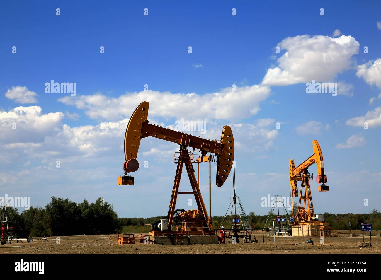 Tarim oil field pumping units Stock Photo - Alamy