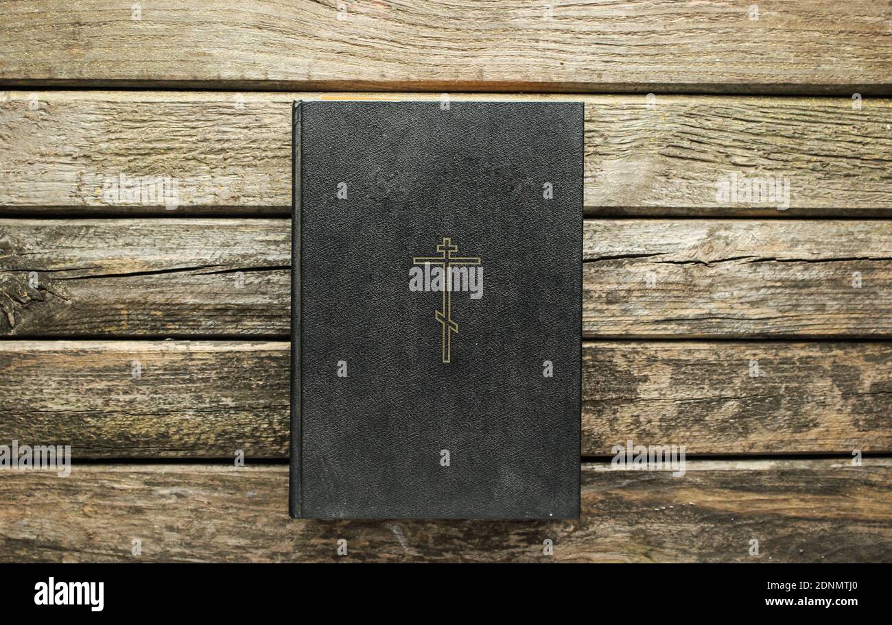 Holy Bible book on old rustic boards. Religion concept Stock Photo - Alamy