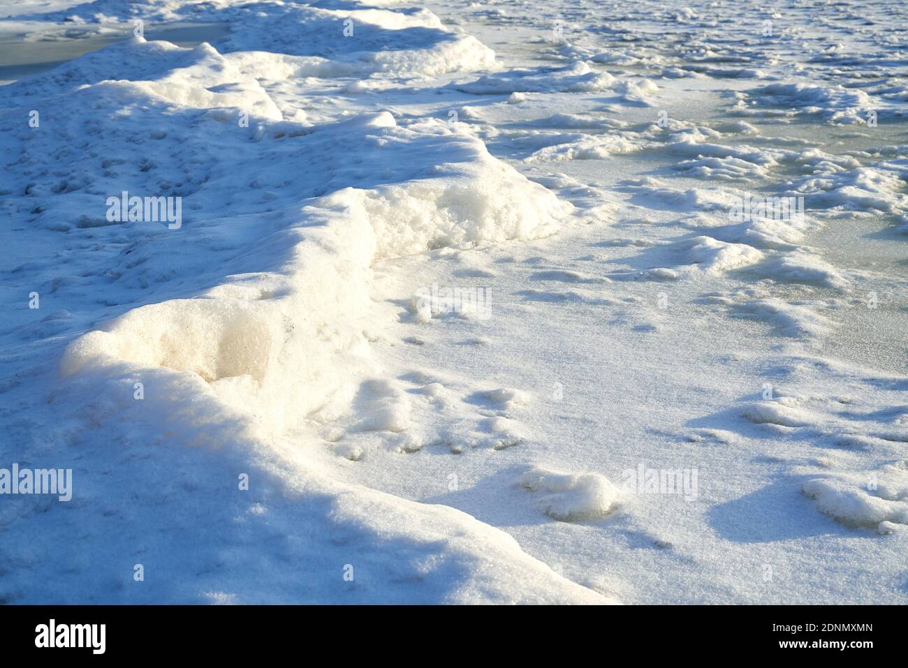 Winter landscape with clear sky and snow cover of ice on reservoir of ...