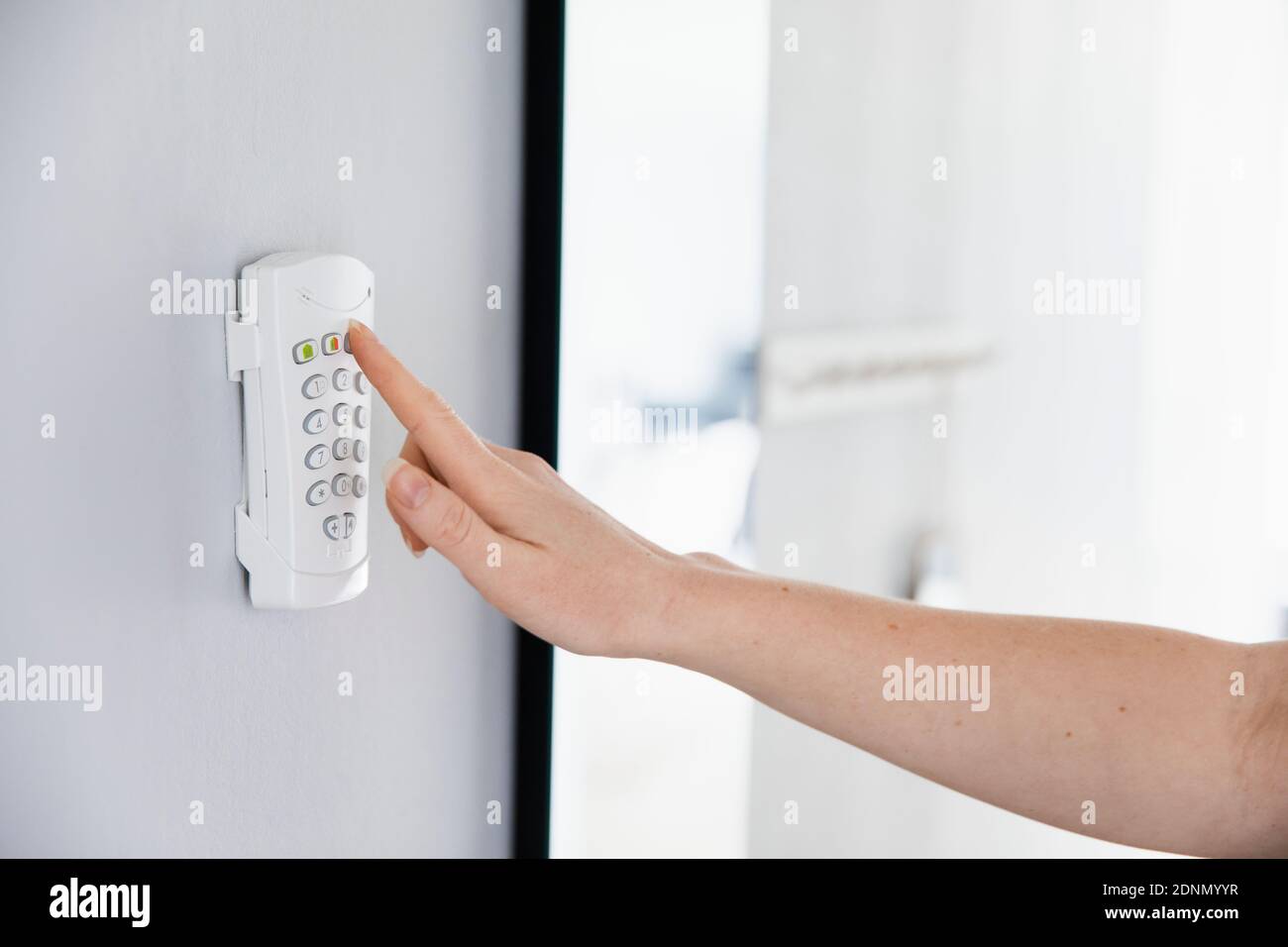 Hand entering code Stock Photo - Alamy