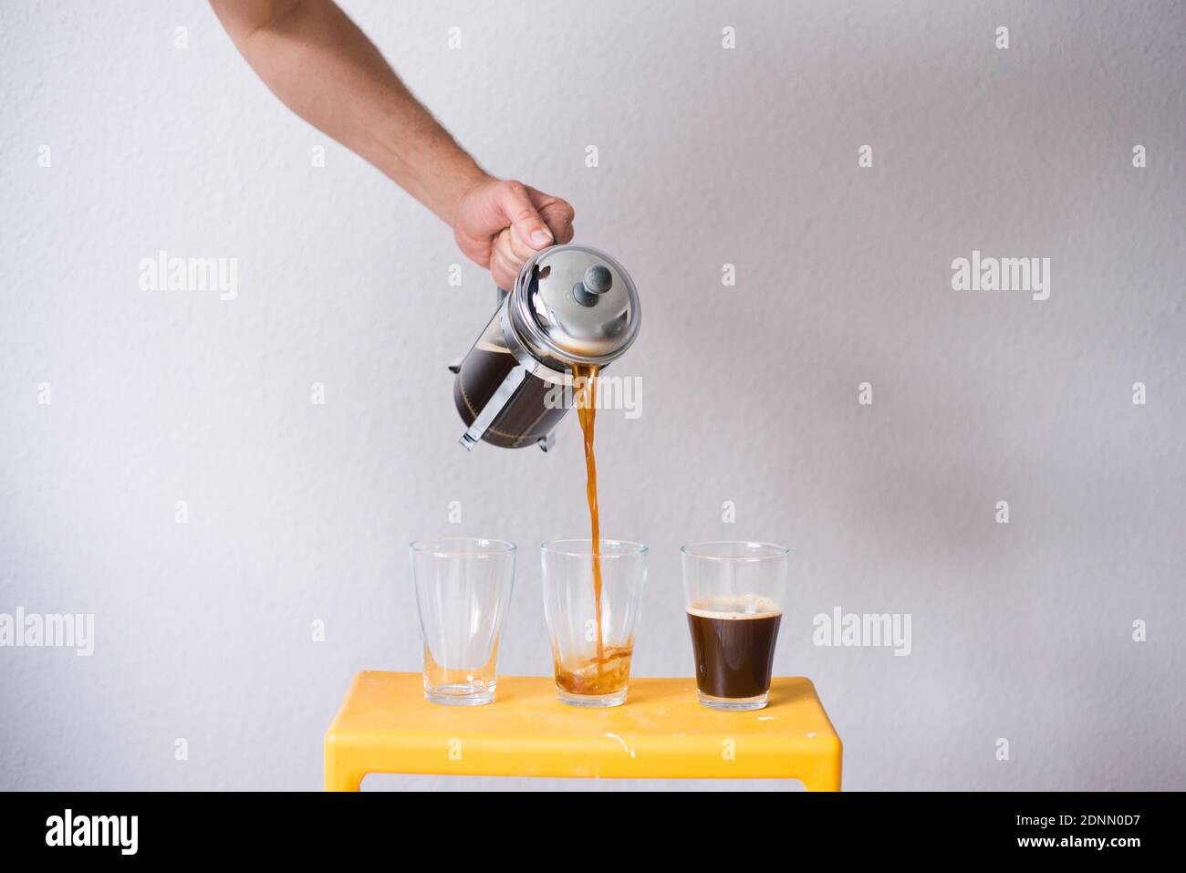 Hand pouring coffee hi-res stock photography and images - Alamy