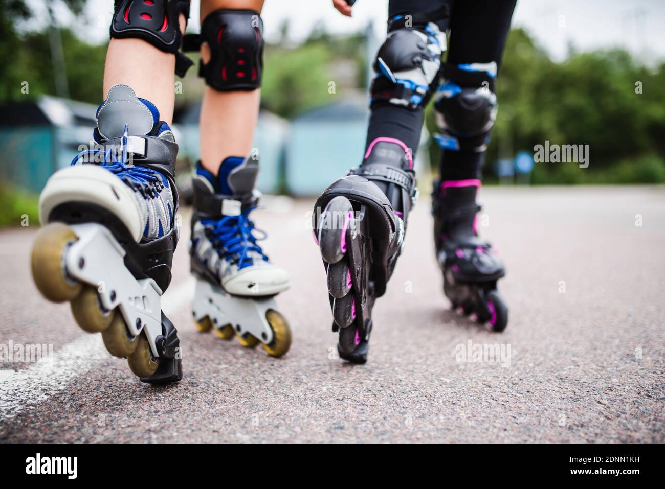 People inline skating Stock Photo - Alamy