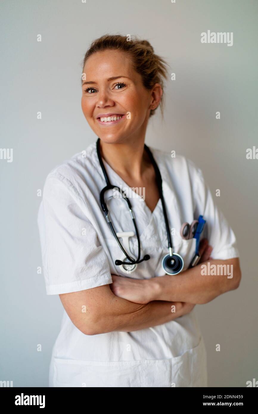 Female doctor looking at camera Stock Photo - Alamy