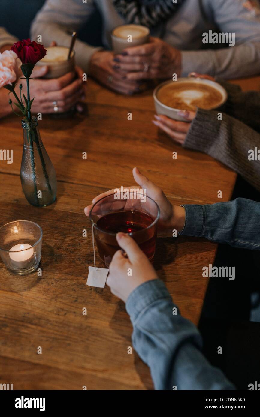 Tea together hands hi-res stock photography and images - Alamy