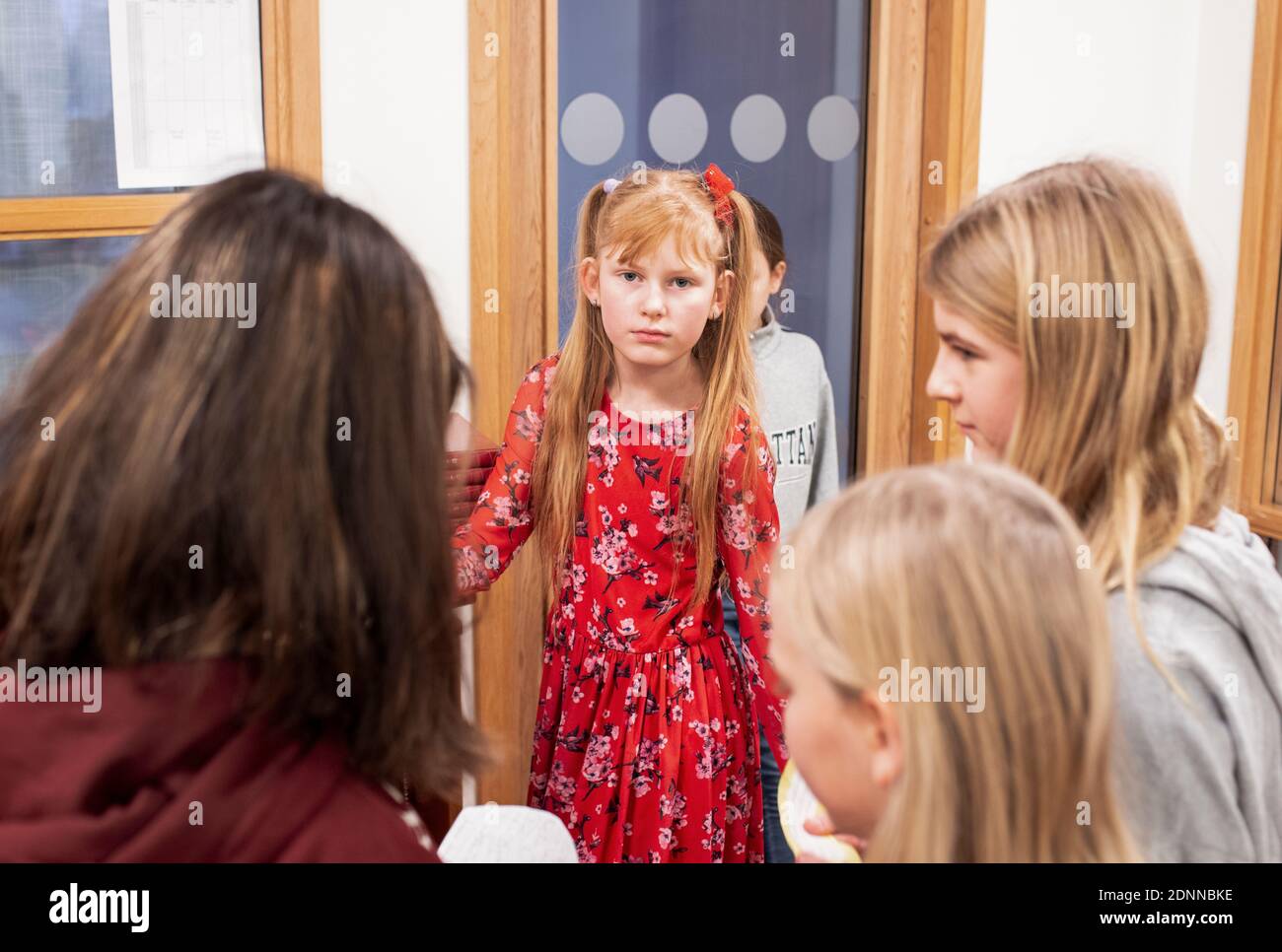 Girls talking at school Stock Photo - Alamy