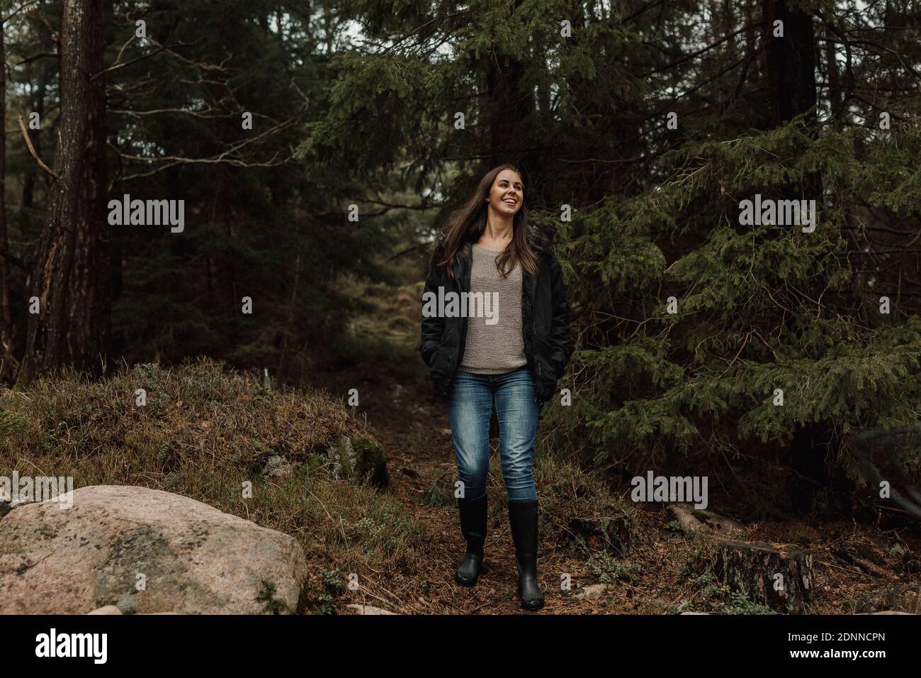 Happy woman in forest hi-res stock photography and images - Alamy