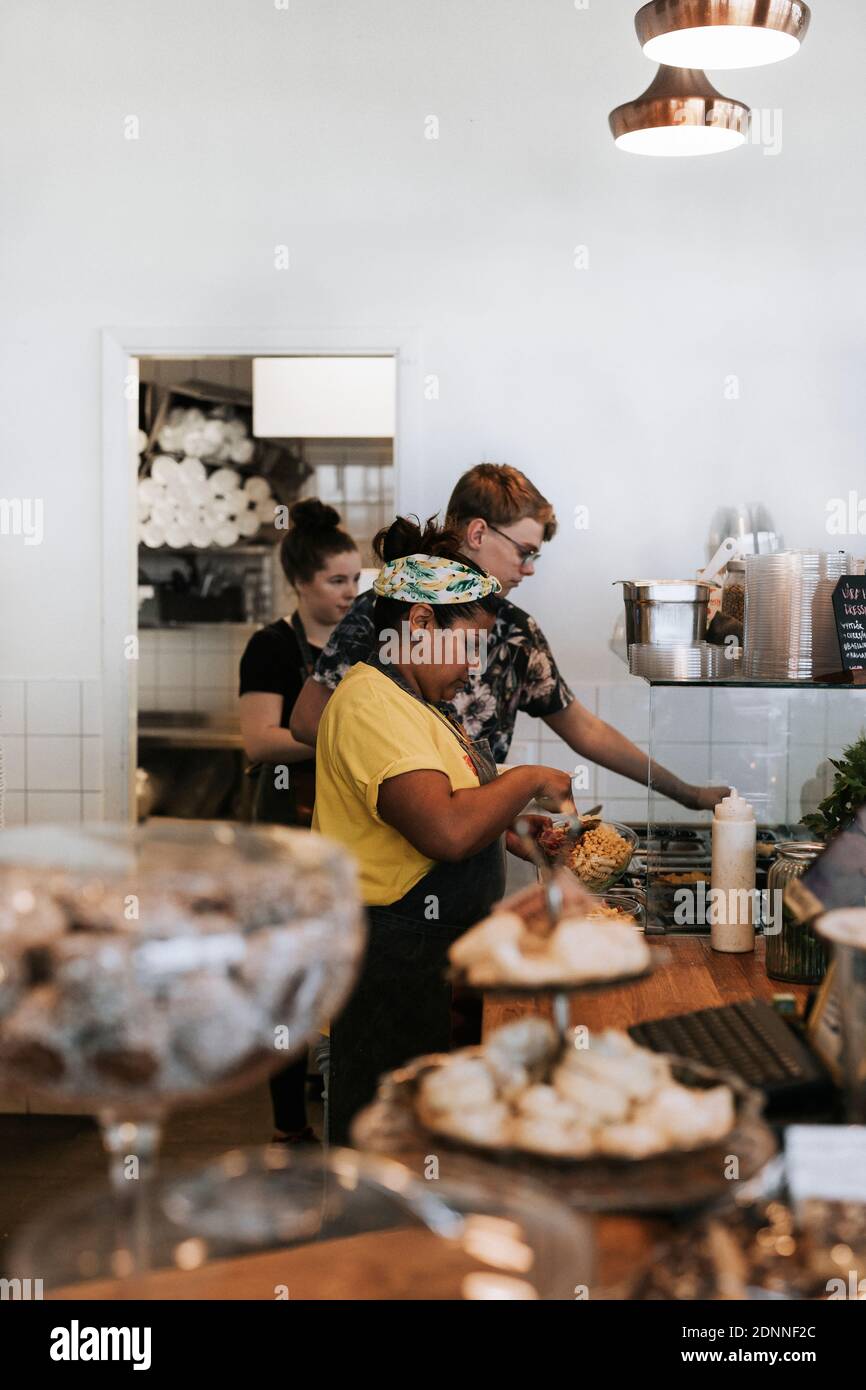People working in cafe Stock Photo - Alamy