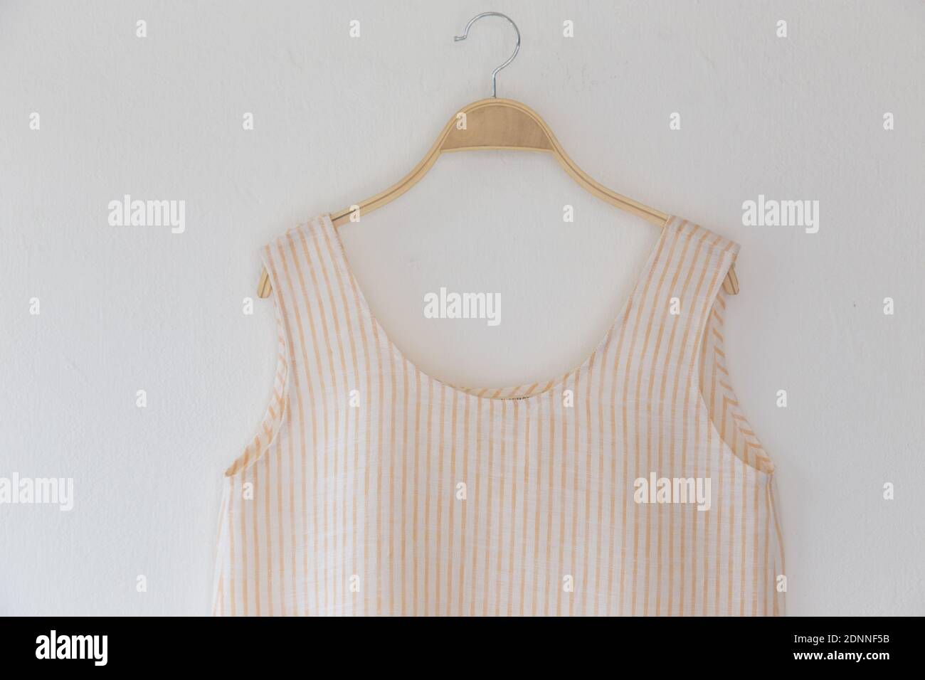 Top Hanging On White Background Stock Photo - Alamy