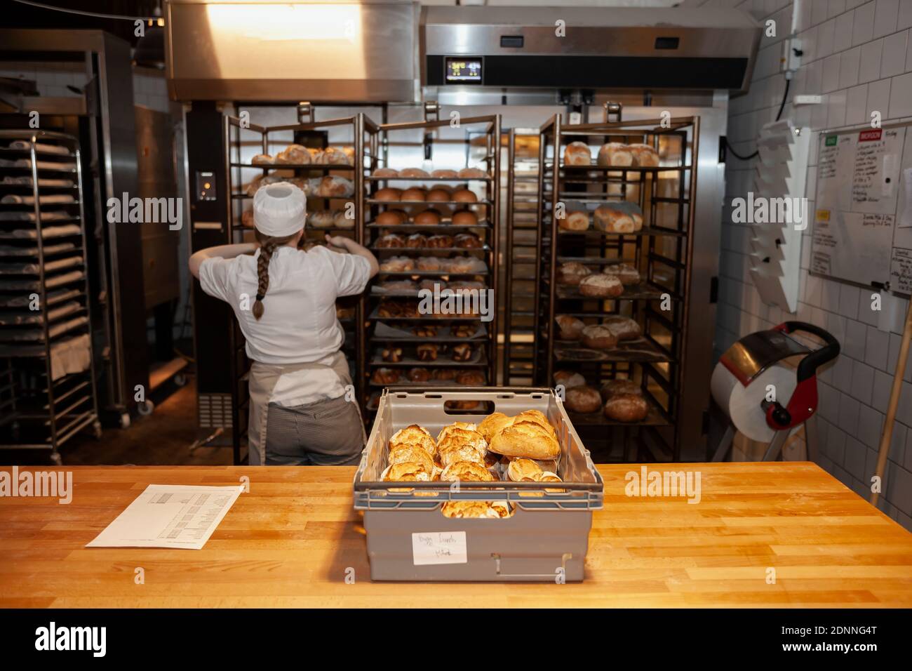 Female baker in bakery Stock Photo - Alamy