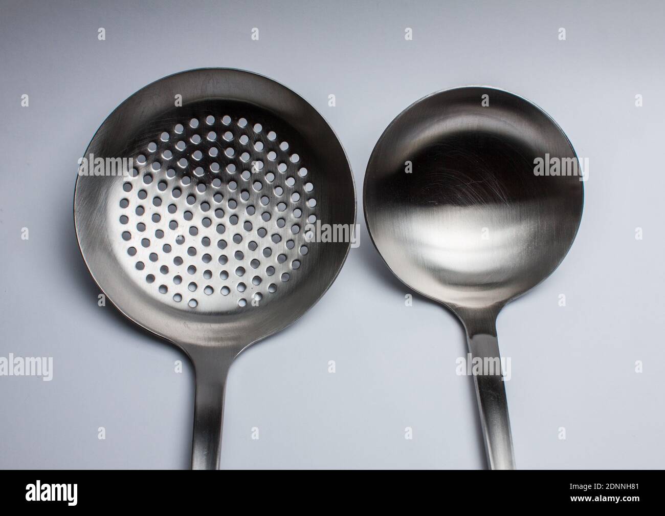 Ladle with hole hi-res stock photography and images - Alamy