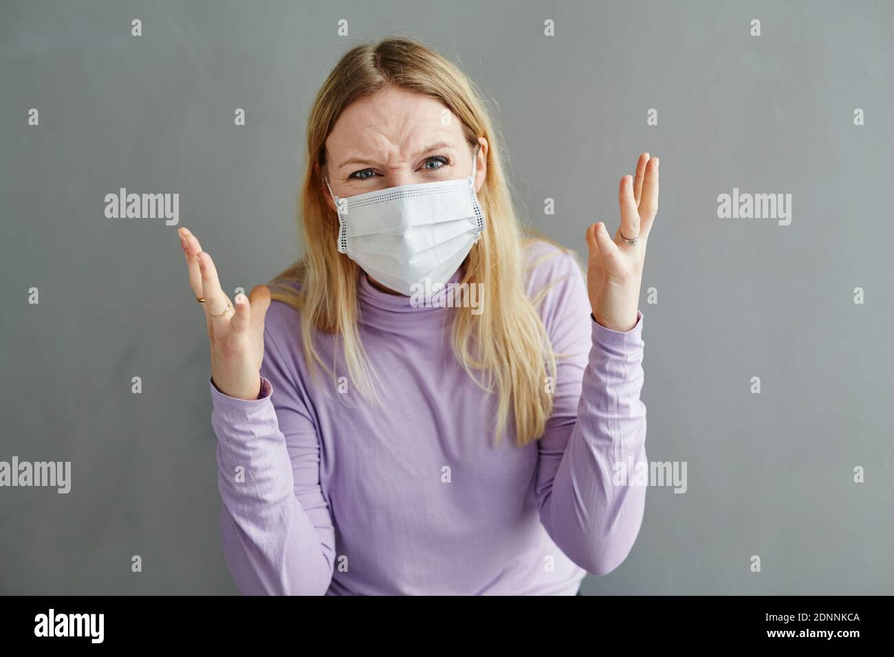 Angry woman face mask hi-res stock photography and images - Alamy