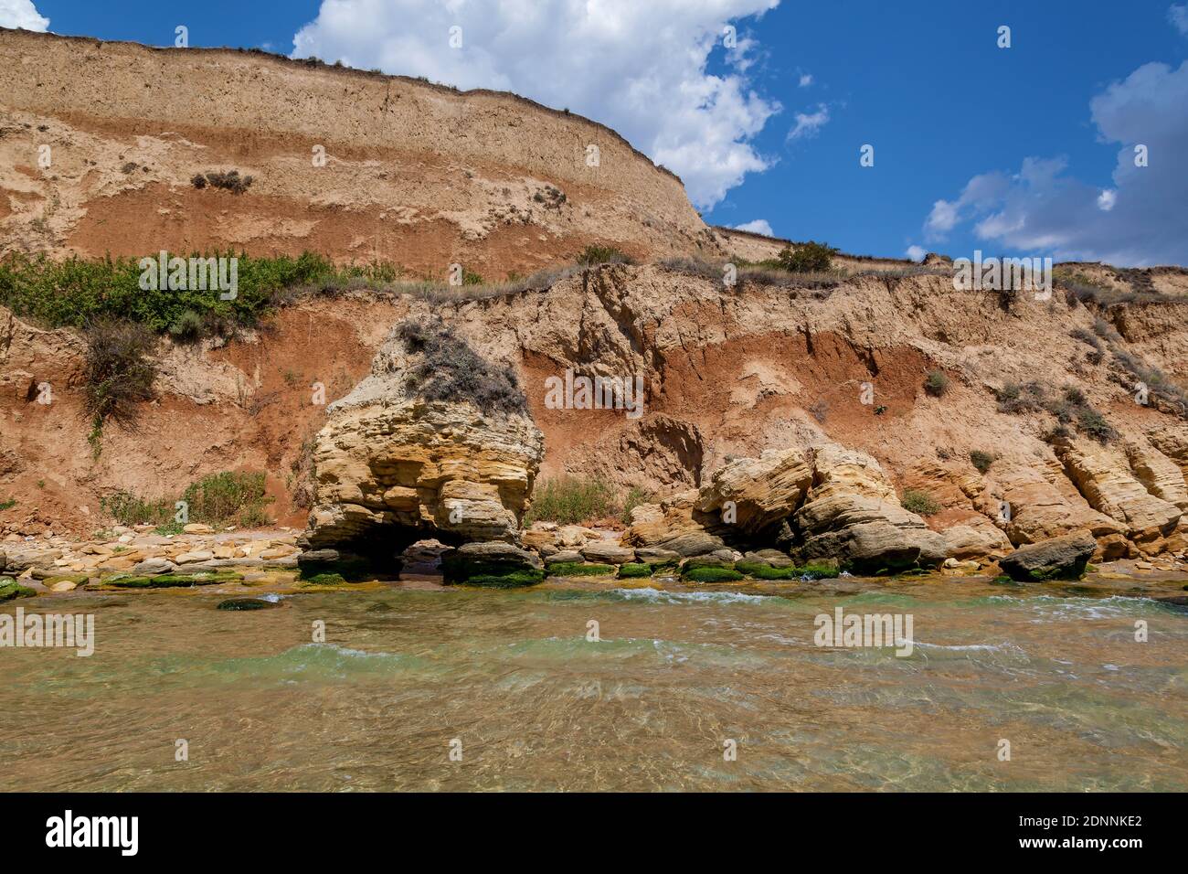 Yellow sandy rocks and stones of various forms on the Black Sea coast ...