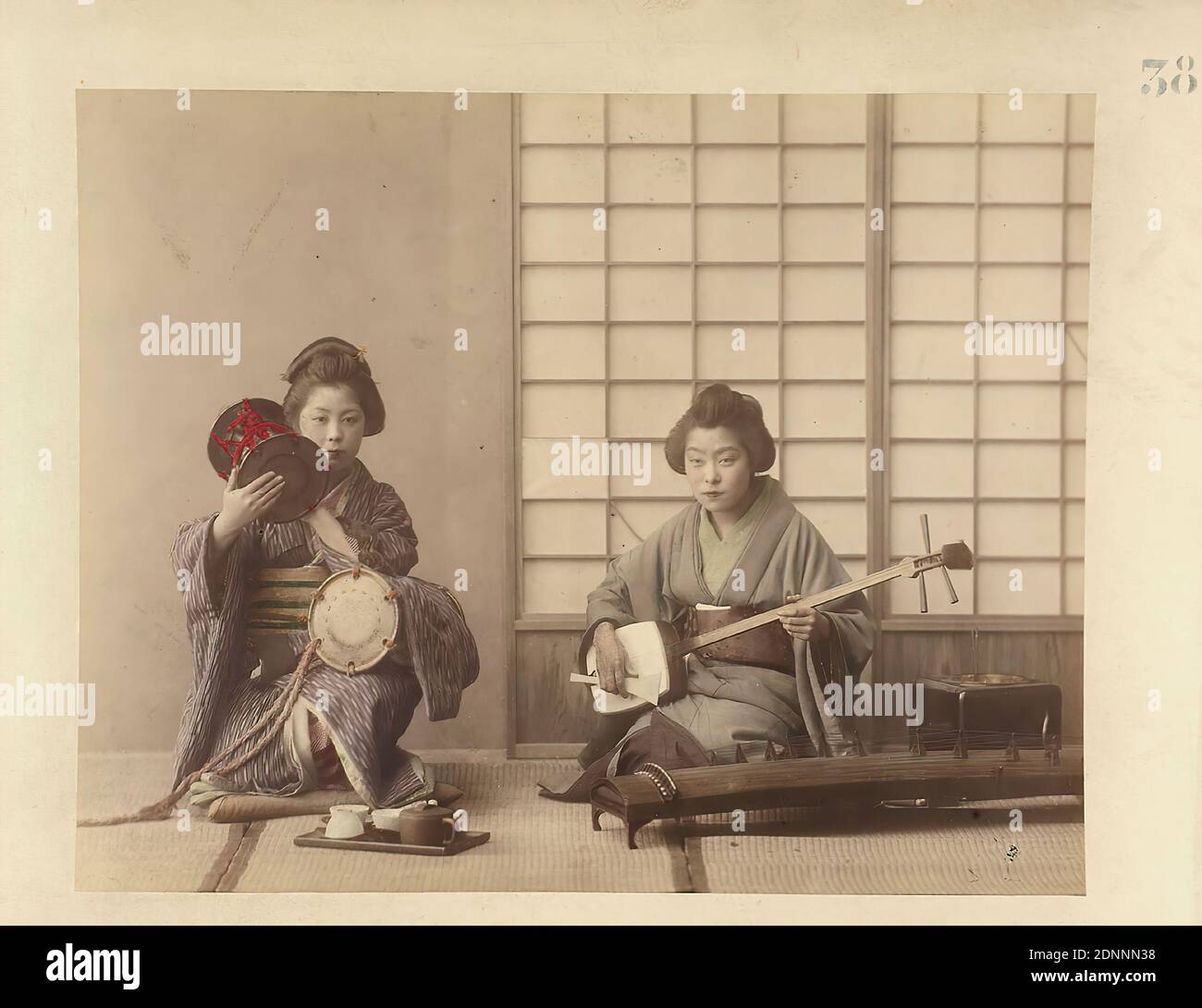 Two japanese women playing instruments hi-res stock photography and ...