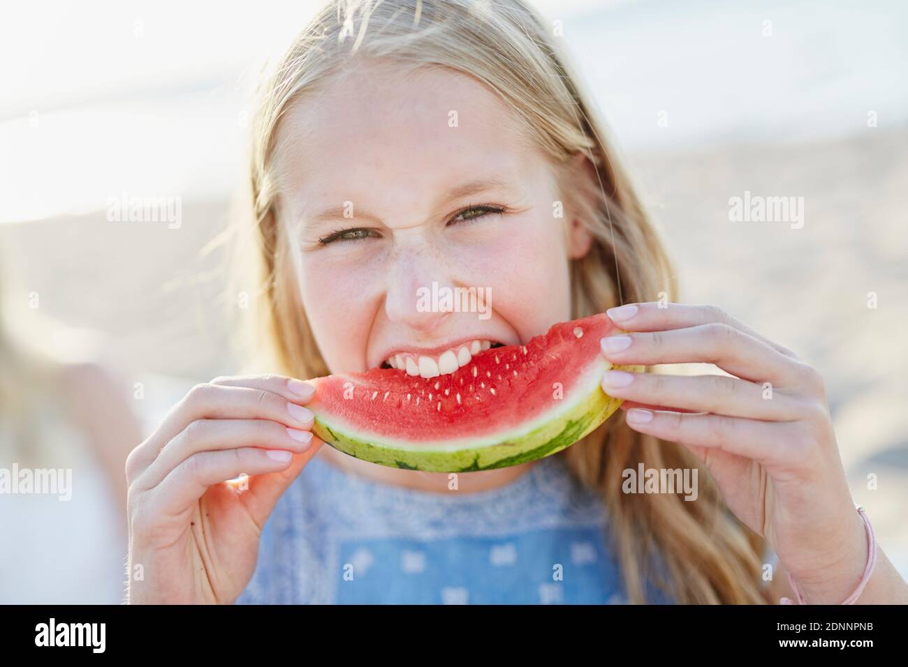 Woman eating watermelon Stock Photo - Alamy