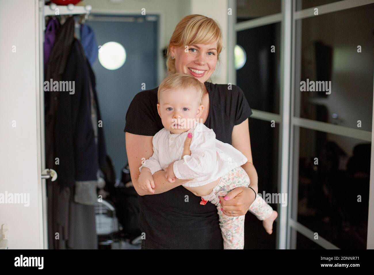 Mother baby carry woman hi-res stock photography and images - Alamy