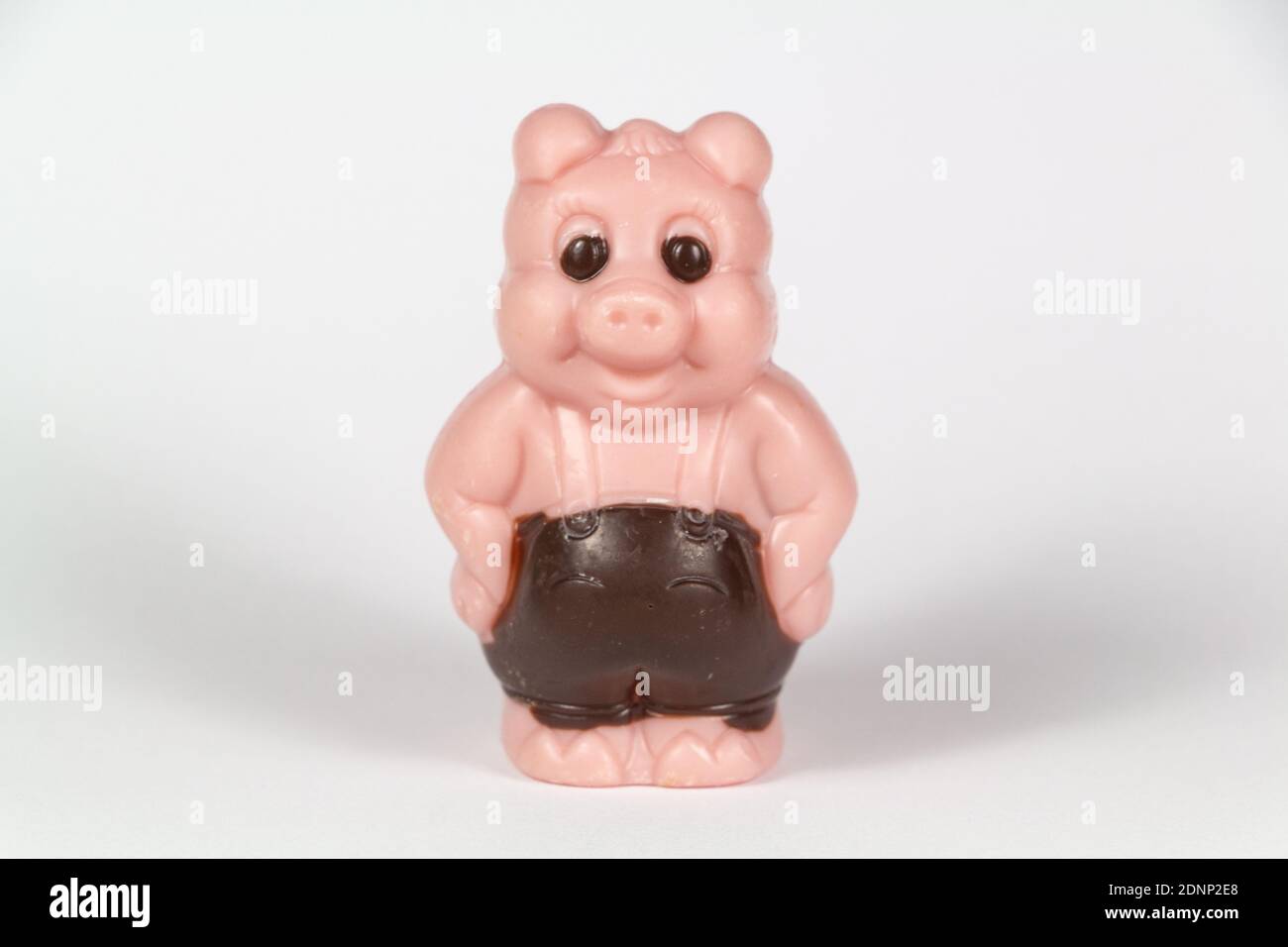 Chocolate pig in white chocolate colored in pink for easter Stock Photo ...