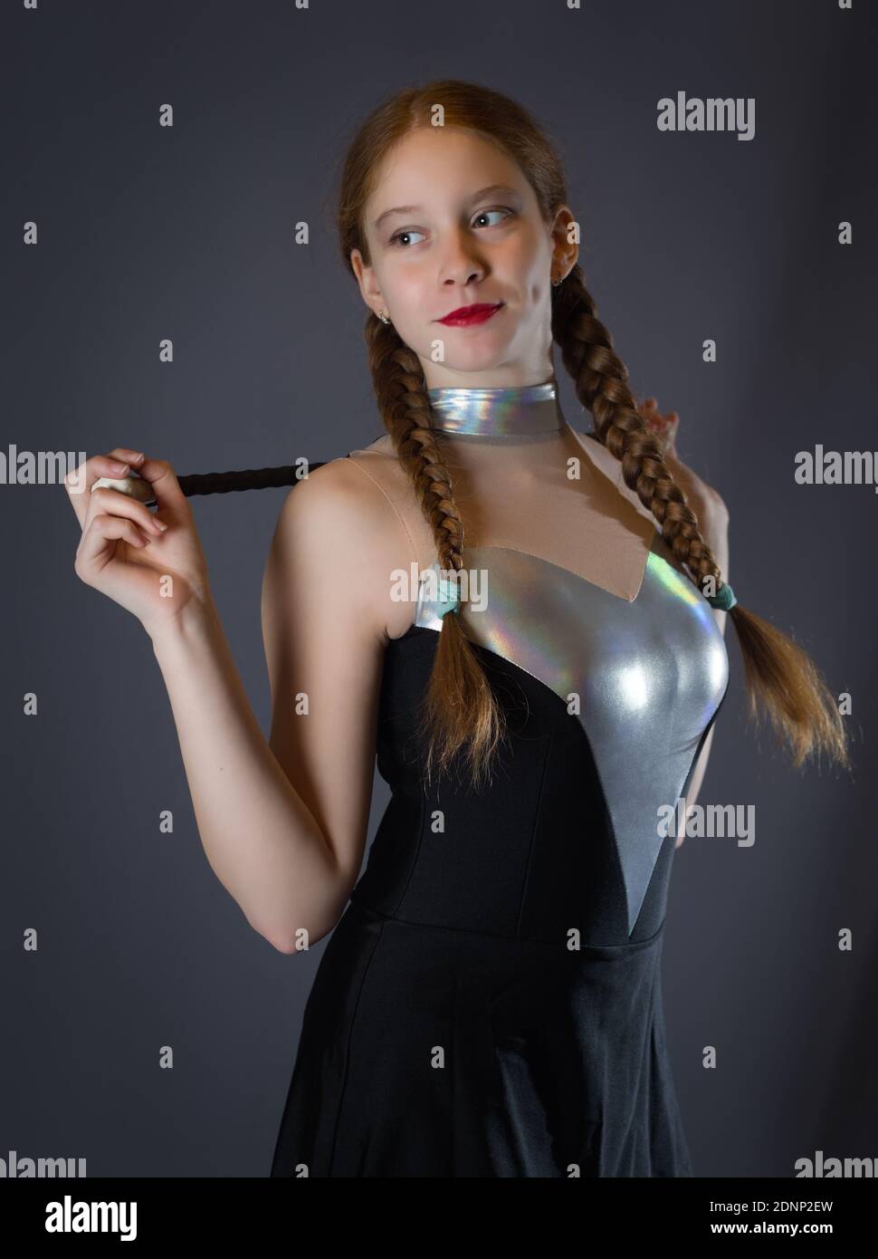 Redhead Teen Majorette Girl with Pigtails Posing in Studio Stock Photo ...