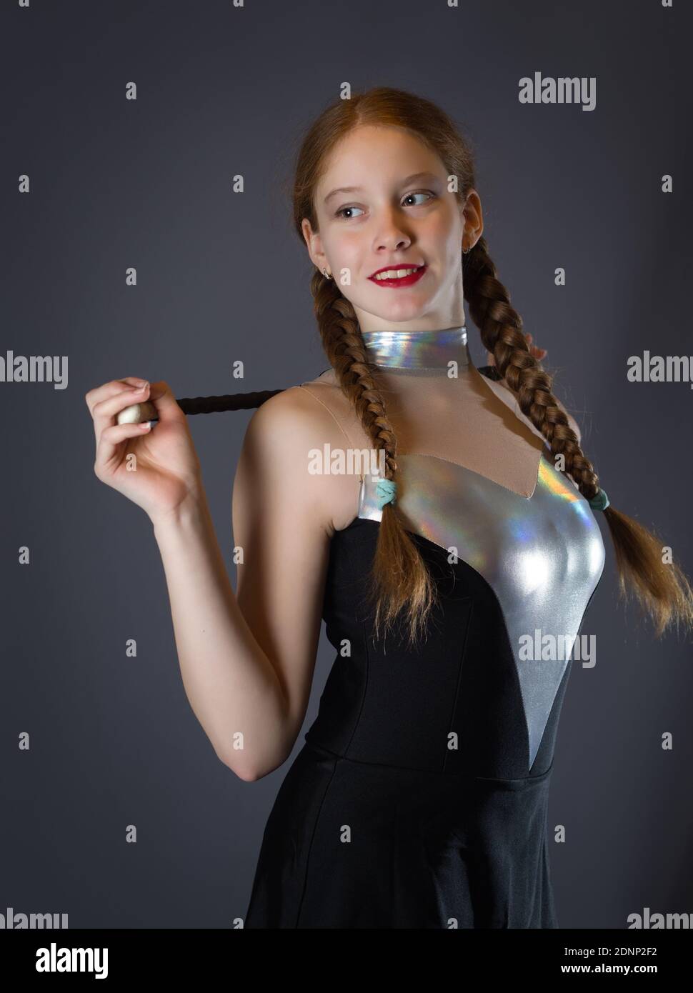 Redhead Teen Majorette Girl with Pigtails Posing in Studio Stock Photo ...