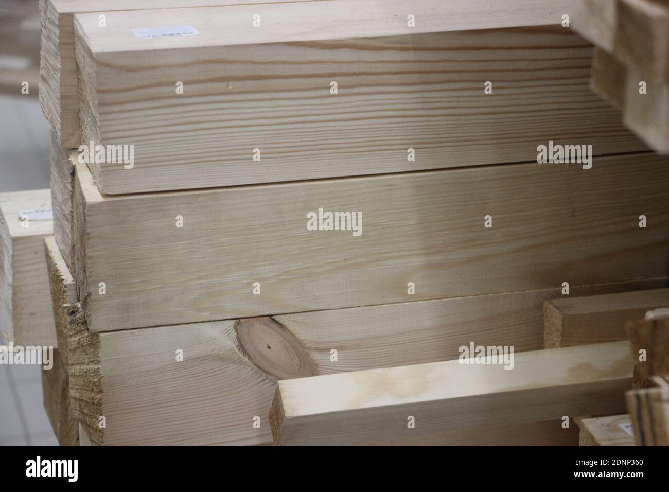 New wooden natural planks in the store. Wholesale and retail Business ...