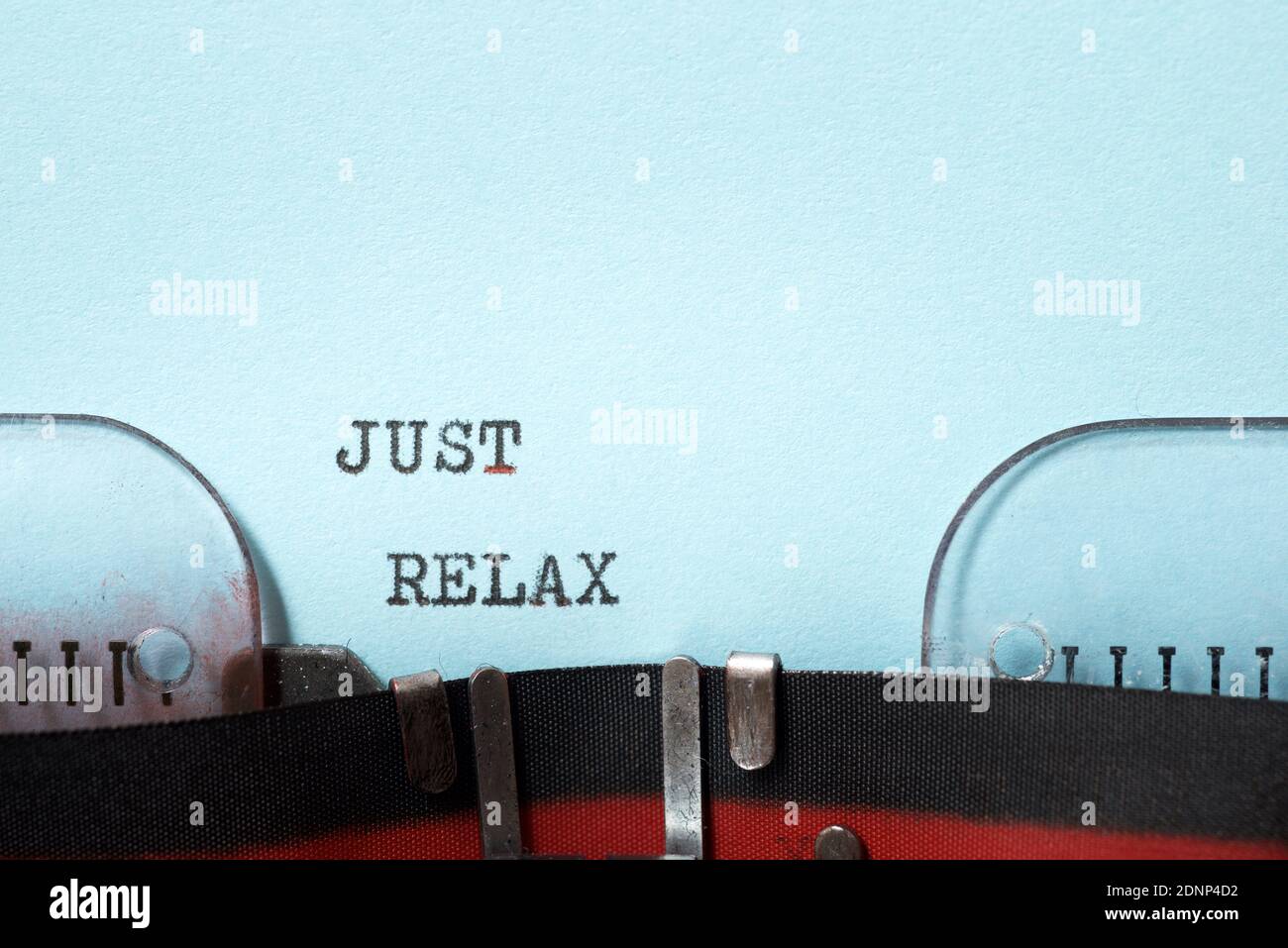 Just relax phrase written with a typewriter Stock Photo - Alamy
