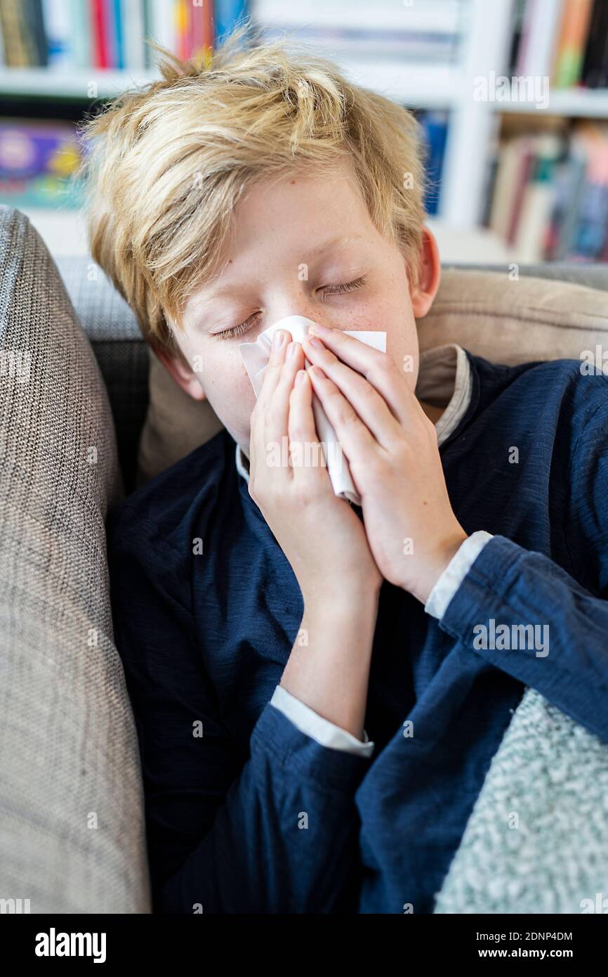 Boy sneezing hi-res stock photography and images - Alamy