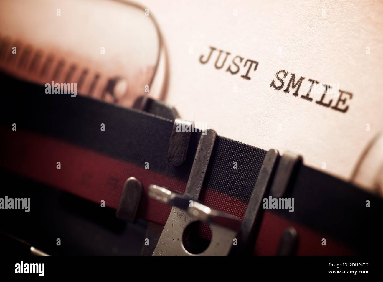 Just smile phrase written with a typewriter Stock Photo - Alamy