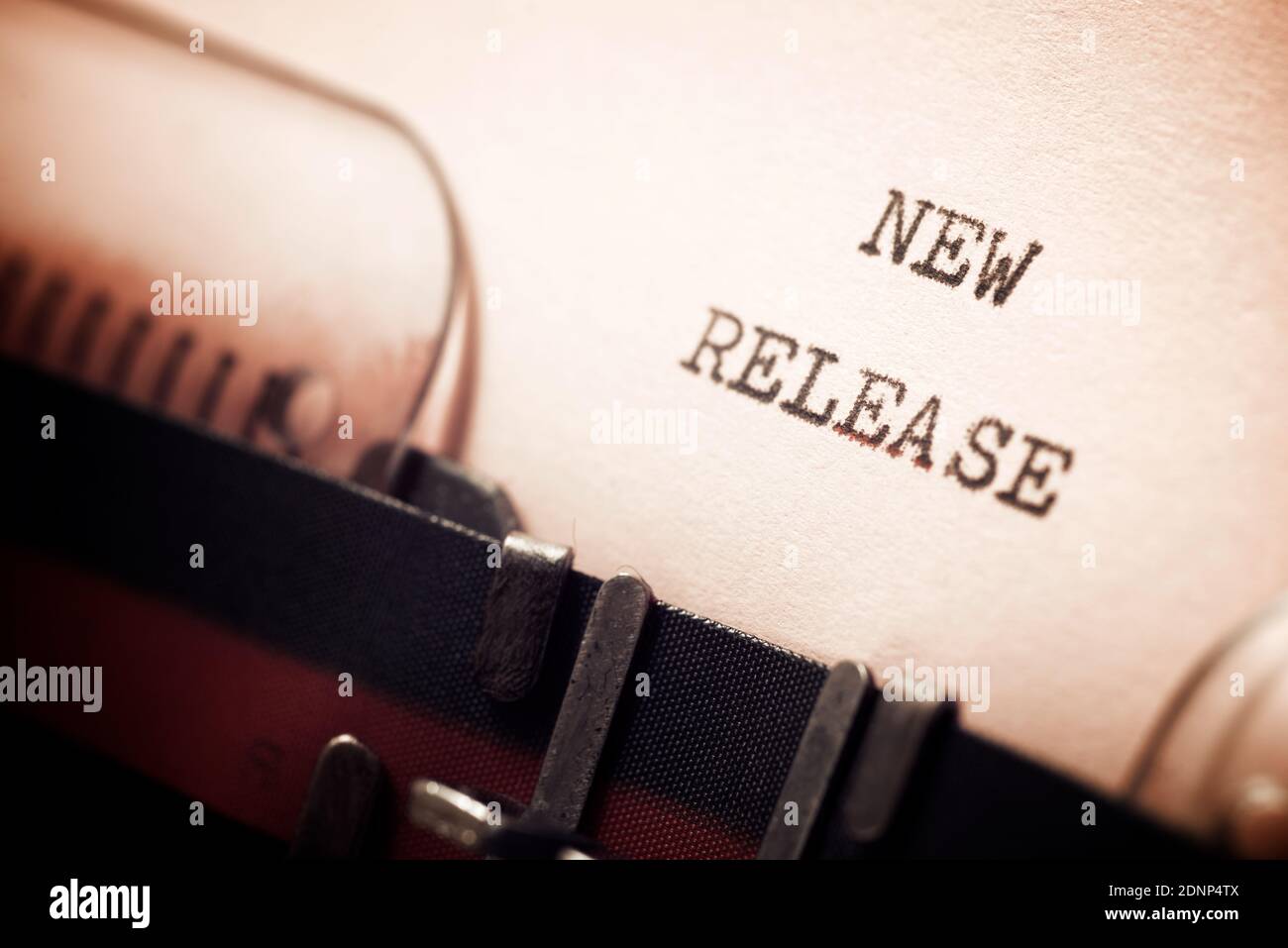 New release phrase written with a typewriter Stock Photo - Alamy