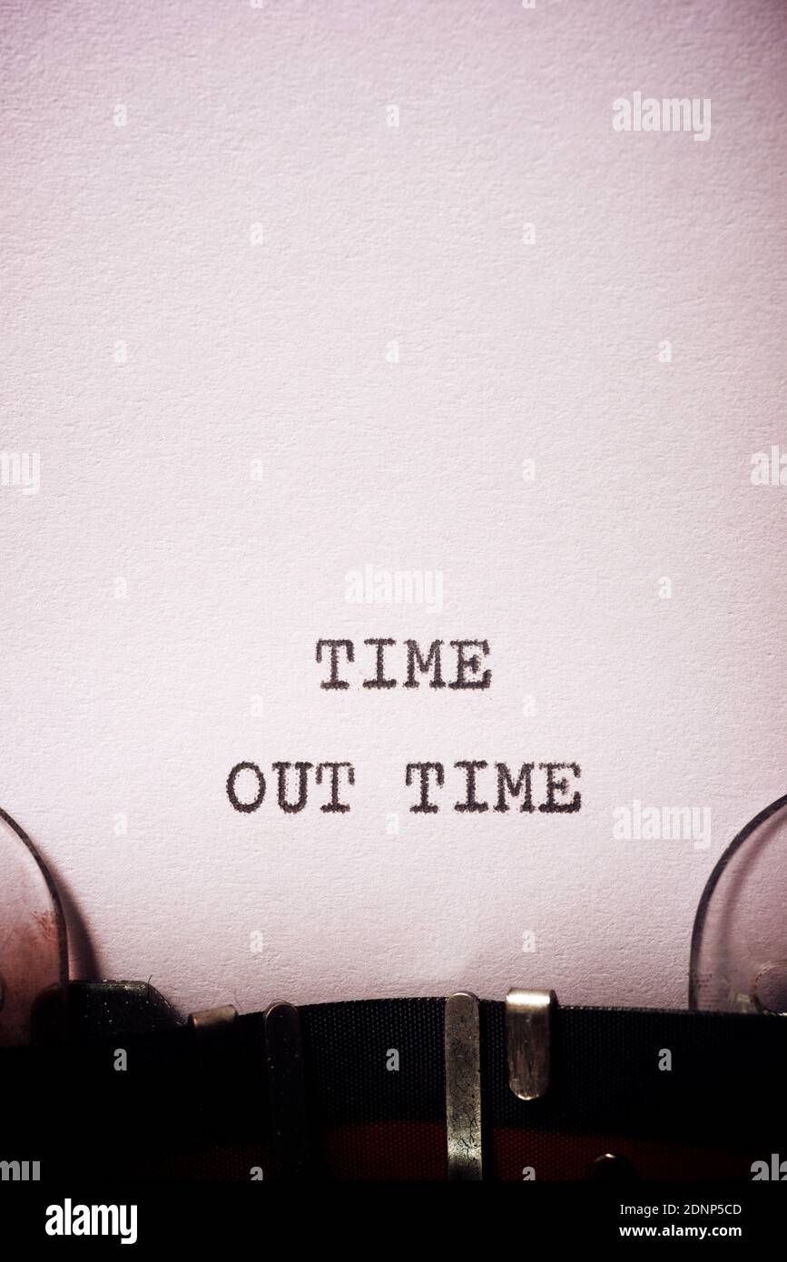 Time out time phrase written with a typewriter Stock Photo - Alamy